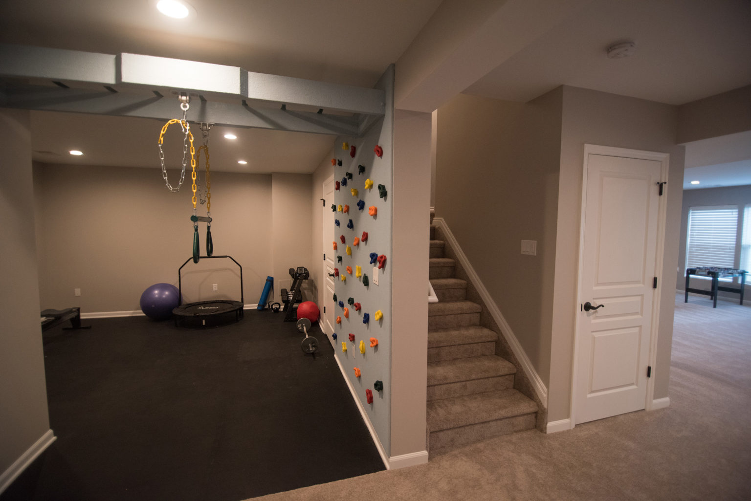 Clarkston, MI Finished Basement with Rock Wall - Basements Plus