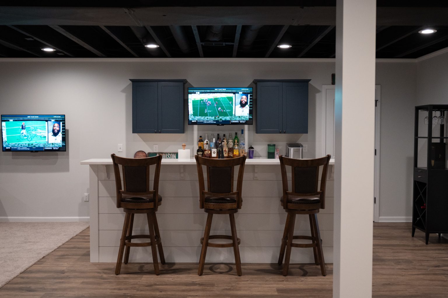 Finished Basement with Bar, Home Office and Bathroom in South Lyon, MI - Basements Plus