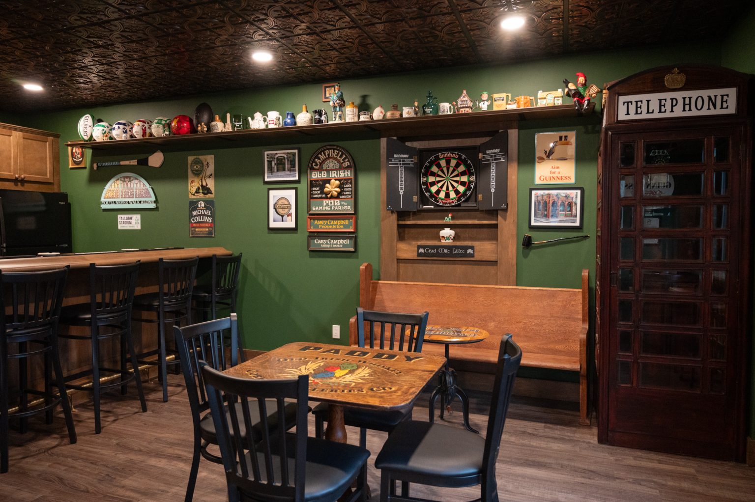 Finished Basement with Irish Themed Bar in Brighton, MI - Basements Plus