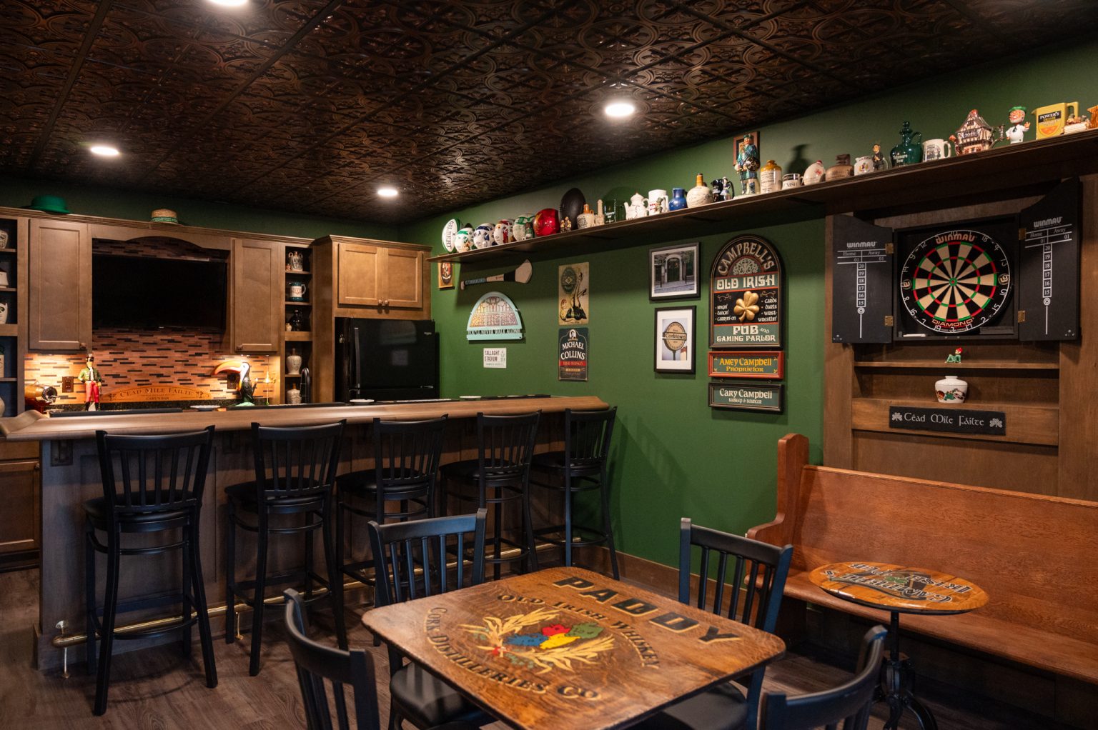 Finished Basement with Irish Themed Bar in Brighton, MI - Basements Plus