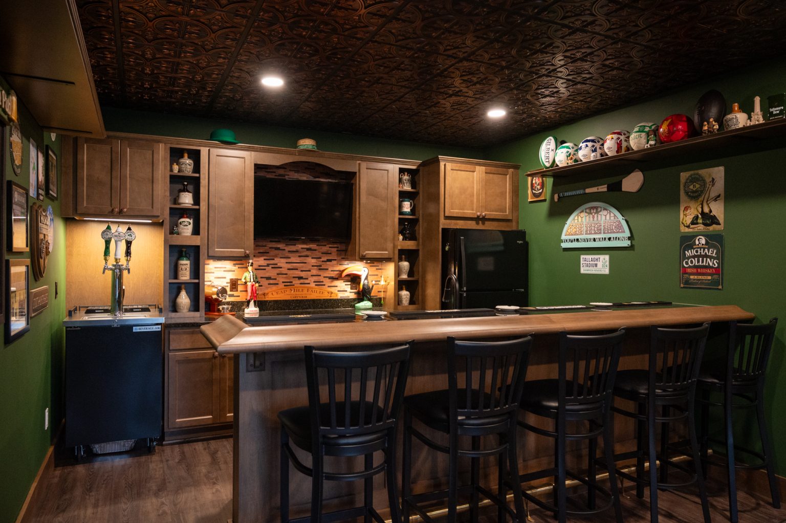 Finished Basement with Irish Themed Bar in Brighton, MI - Basements Plus