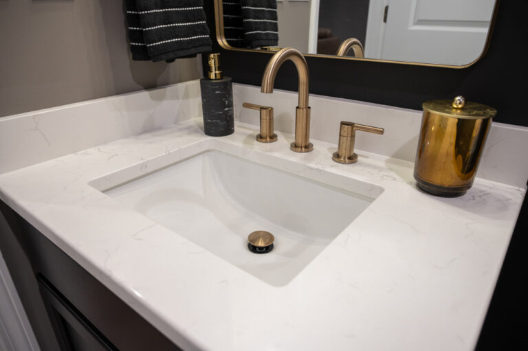 Finished Basement with Seated Bar and Half Bath in South Lyon, MI - Basements Plus