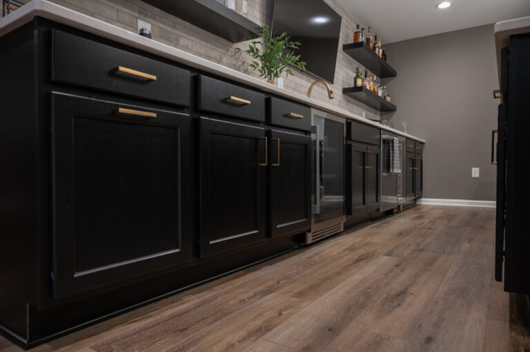 Finished Basement with Seated Bar and Half Bath in South Lyon, MI - Basements Plus